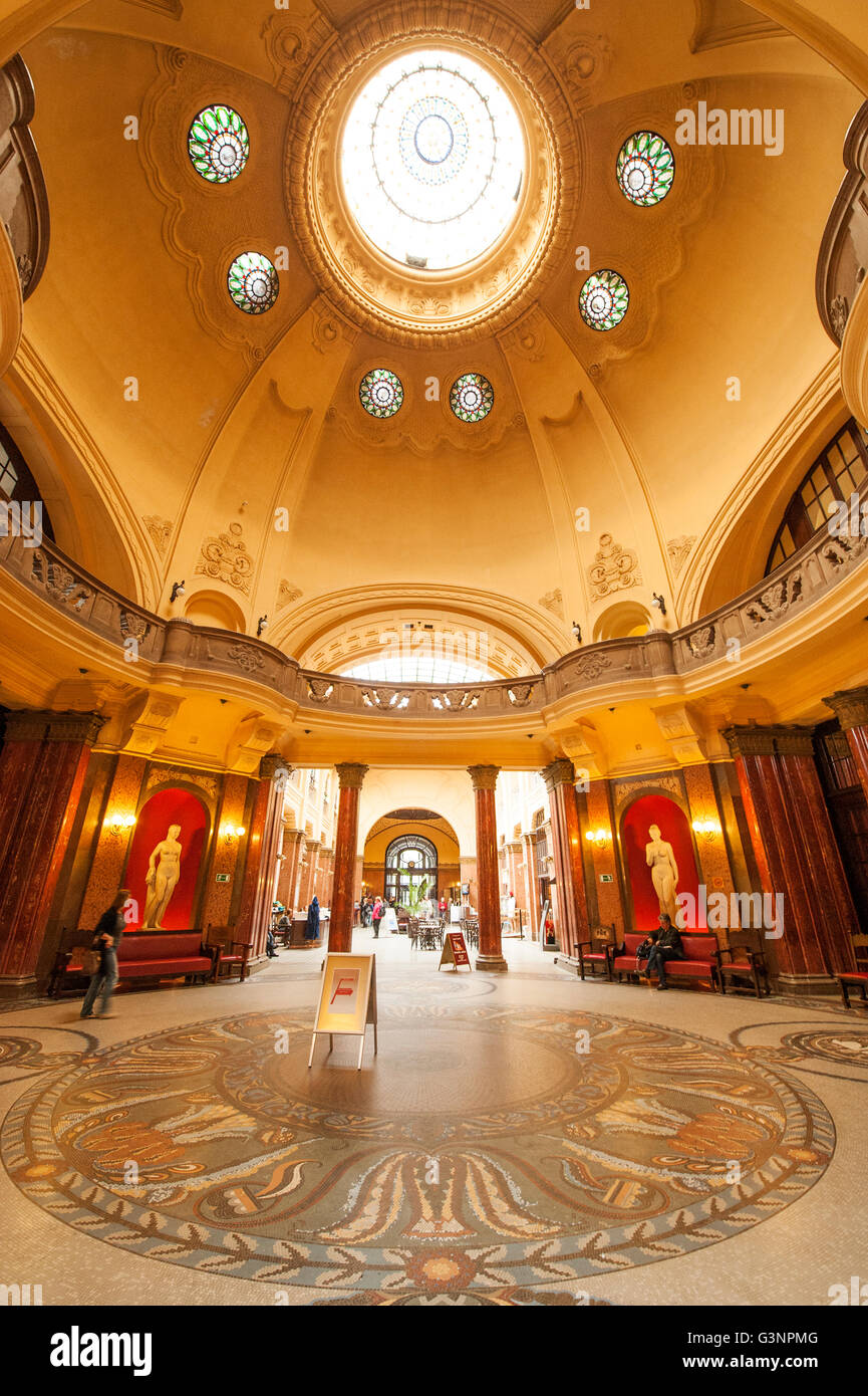 Domed lobby with mosaic tiles and sculptures at Gellert Hotel and ...