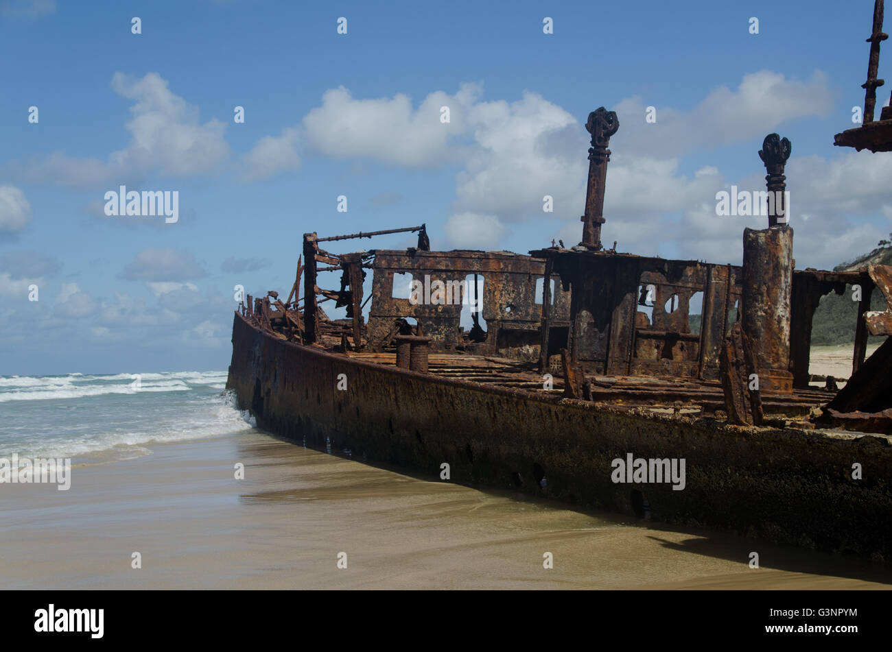 Impressive SS Maheno luxury shipwreck resting on the beach on clear ...