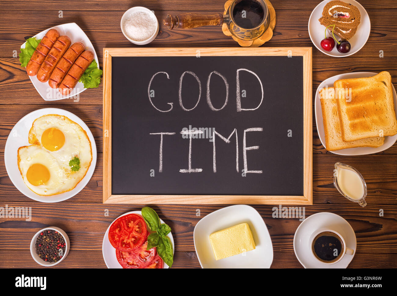 top view of concept breakfast with handwritten text good time on ...