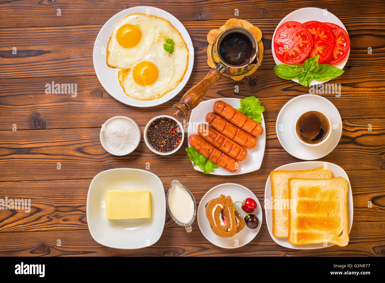 flat lay of concept breakfast with setting food products over wooden ...