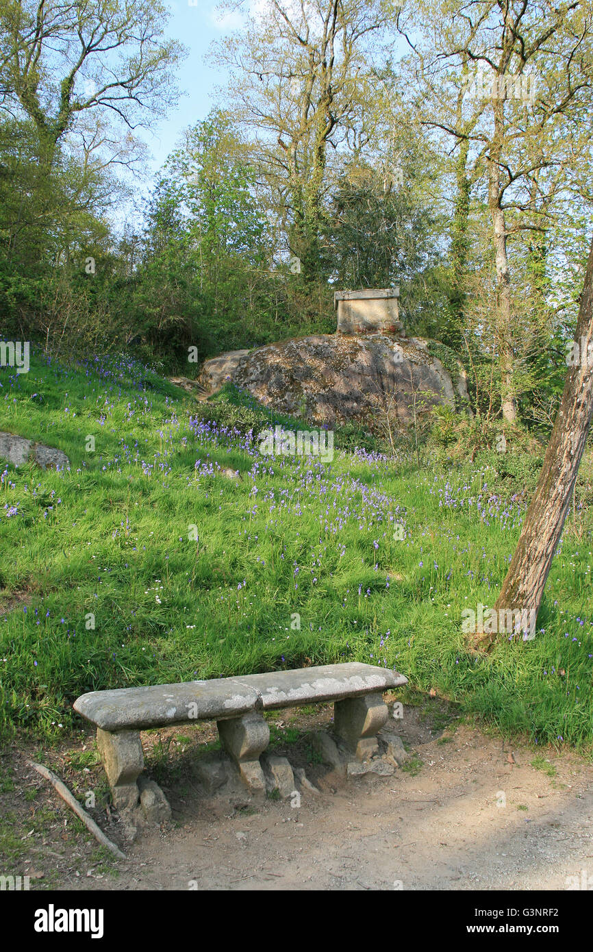 Stone bench and tomb in a park in Clisson (France Stock Photo - Alamy