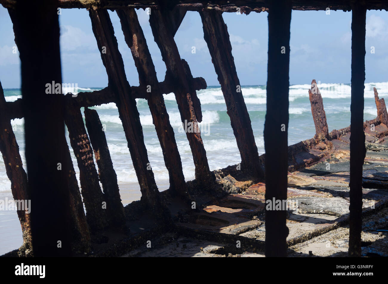 Details of the interior of the SS Maheno luxury shipwreck on clear blue ...