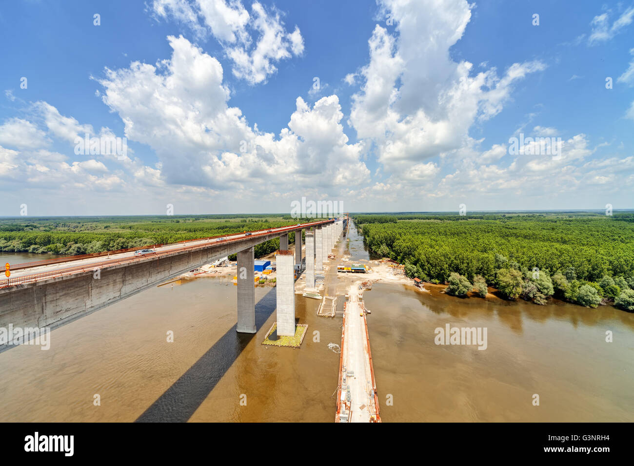 high altitude concrete bridge construction with crane and framework ...