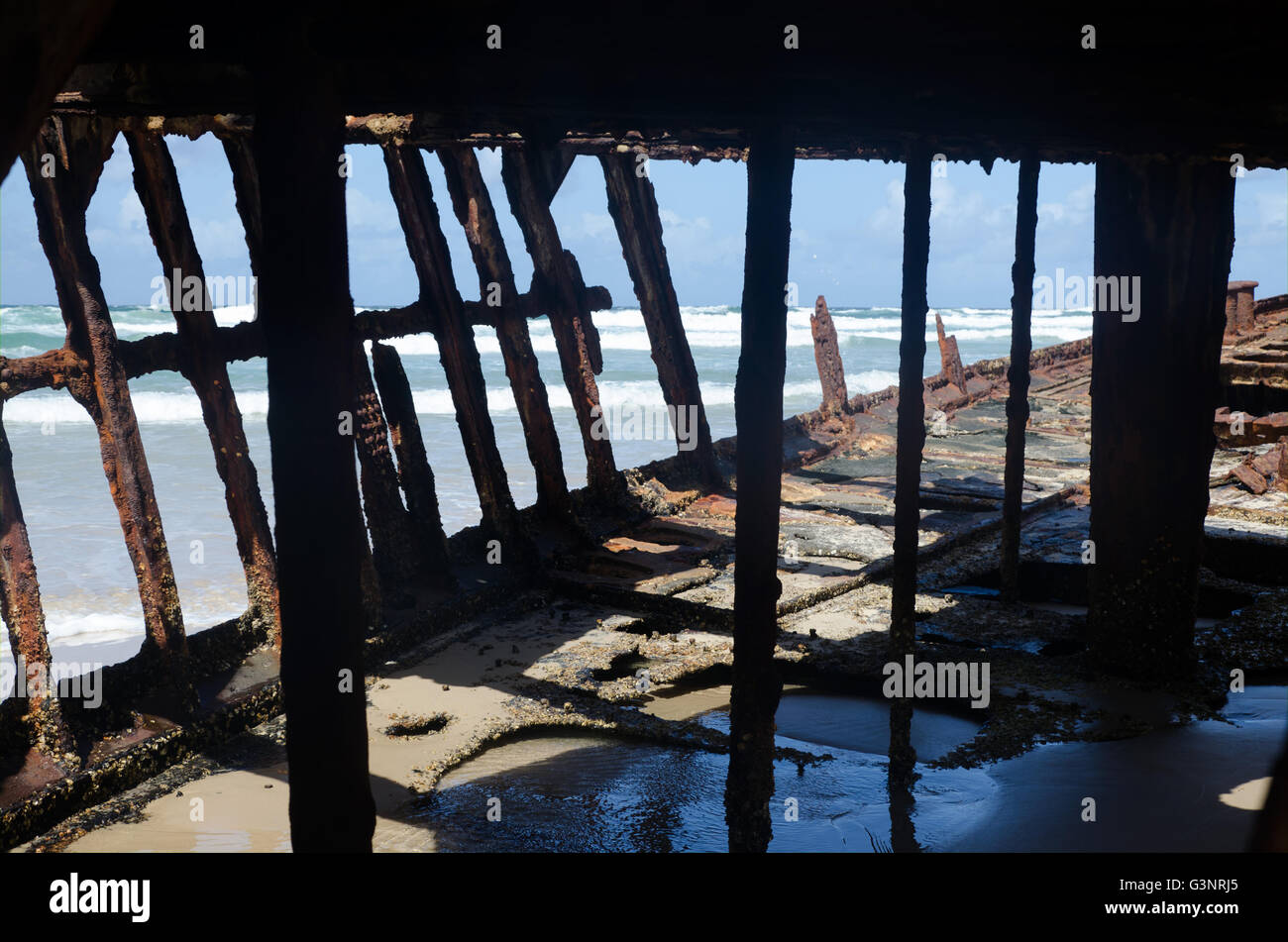 Details of the interior of the SS Maheno luxury shipwreck on clear blue ...