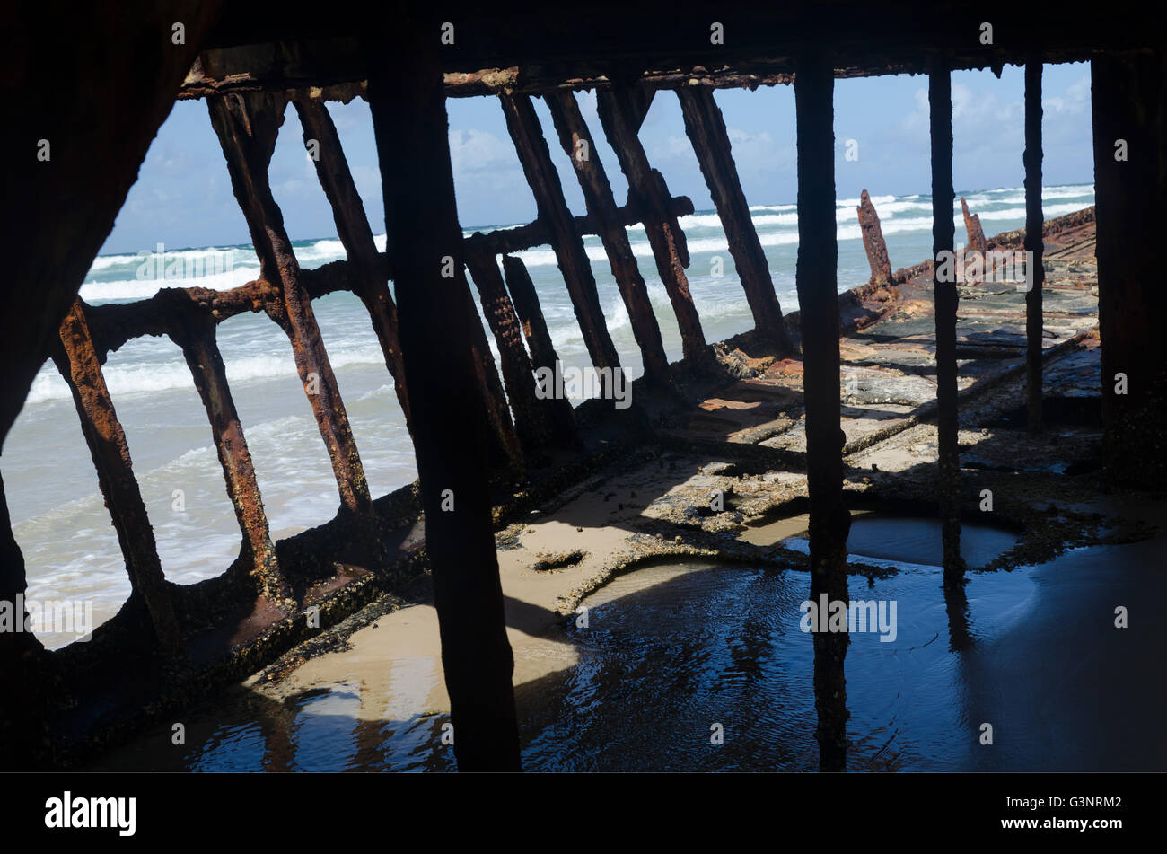 Details of the interior of the SS Maheno luxury shipwreck on clear blue ...
