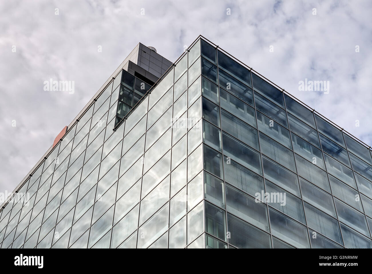Detail of modern building glass facade with reflections Stock Photo - Alamy