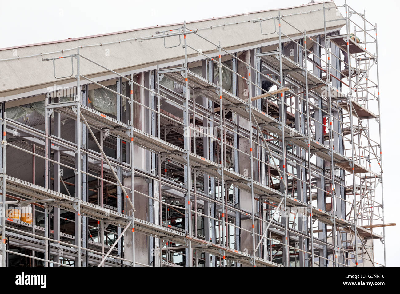 building construction with scaffolding Stock Photo - Alamy