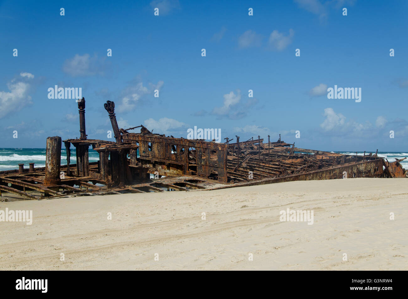 Impressive SS Maheno luxury shipwreck resting on the beach on clear ...