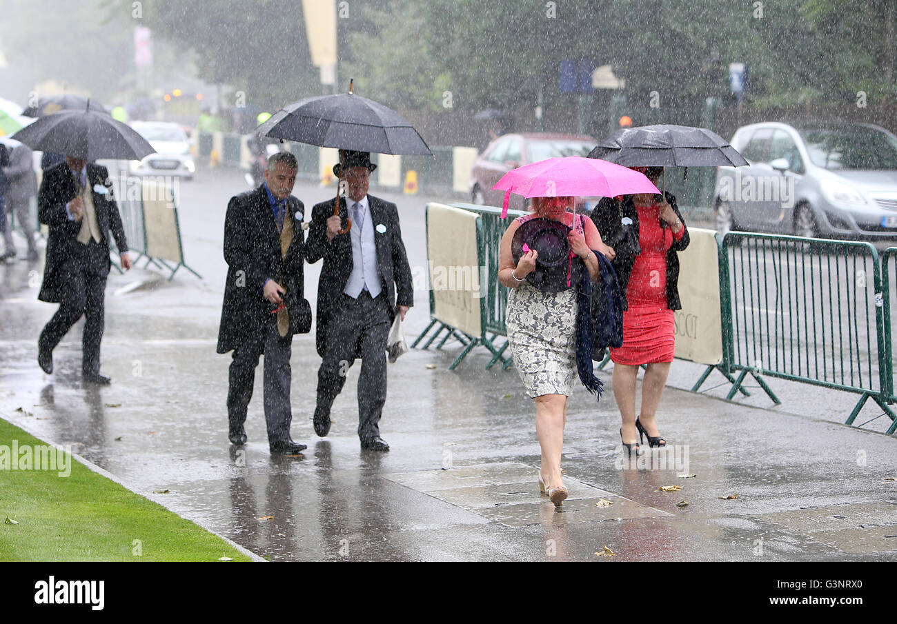 Racegoers arriving in the rain during day one of Royal Ascot 2016, at ...