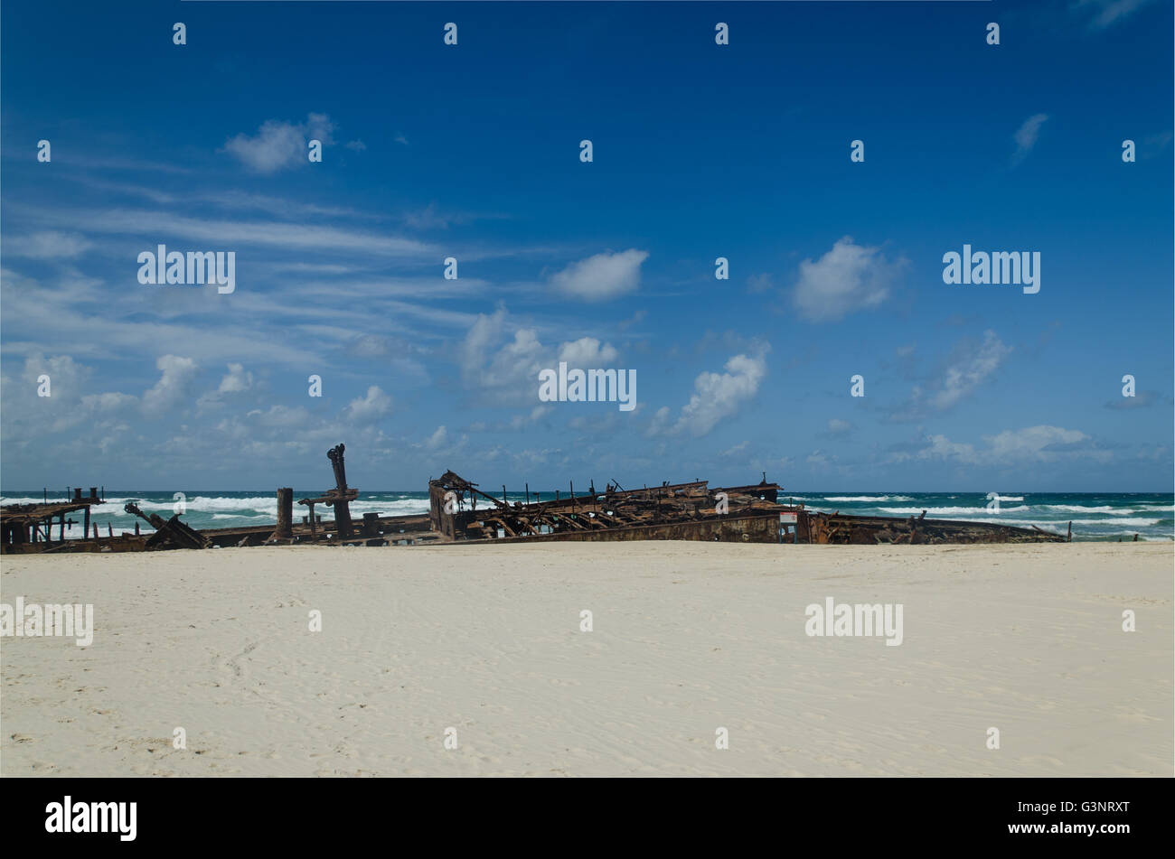 Impressive SS Maheno luxury shipwreck resting on the beach on clear ...