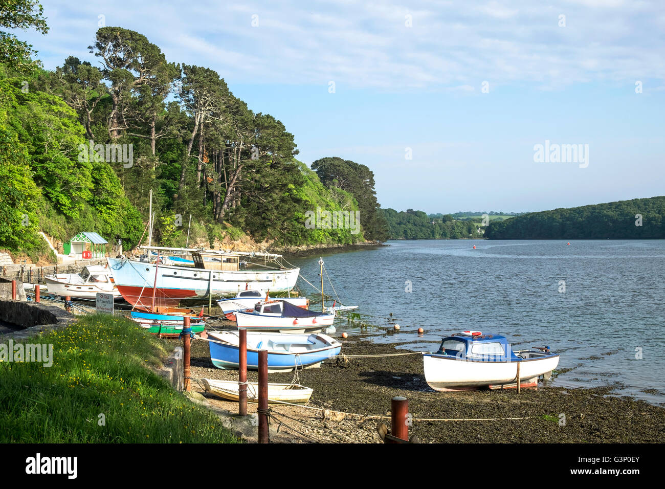 Boats moored at " sunny corner " on the river Fal near Truro in ...