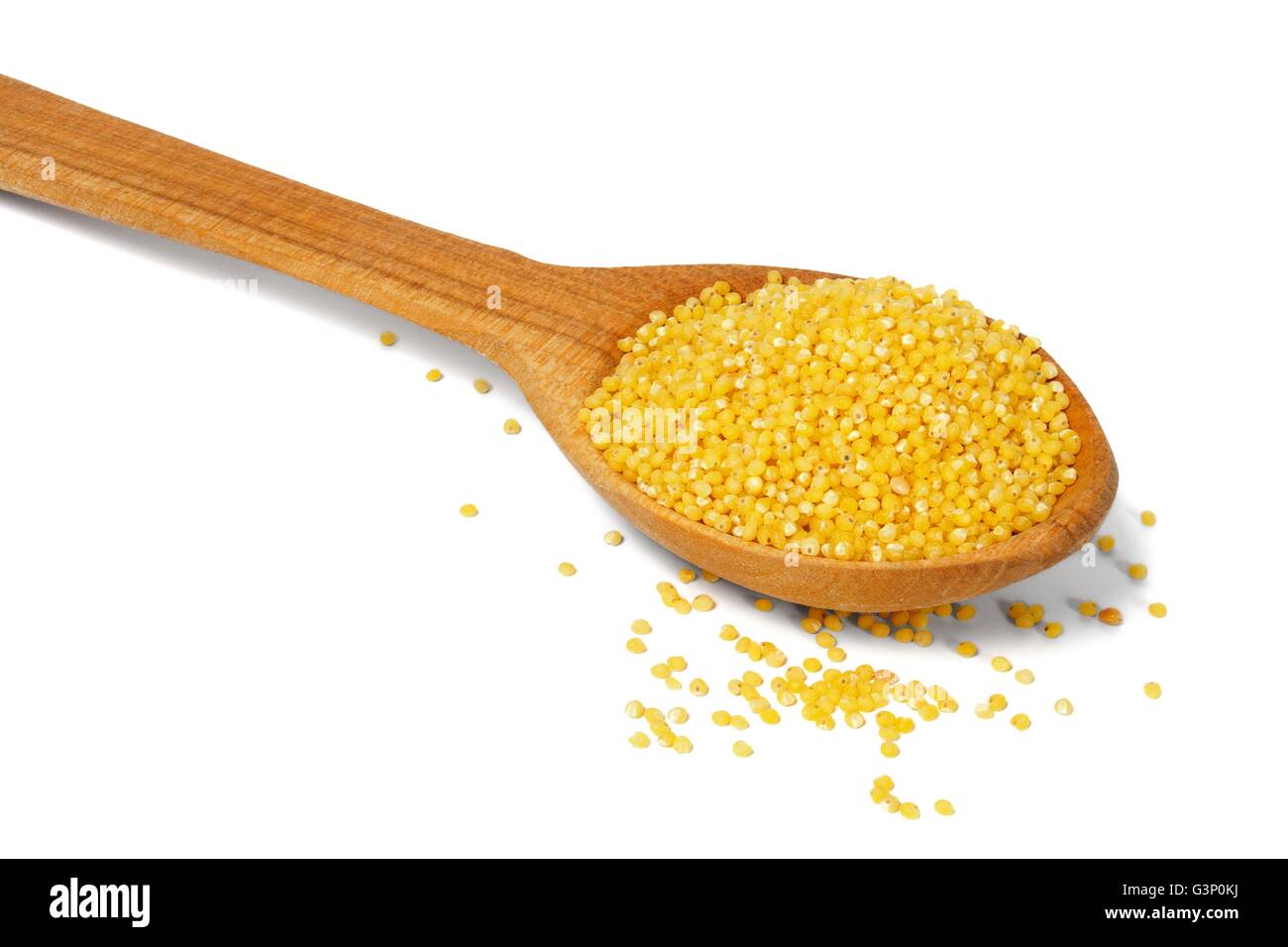 Spoon with millet Stock Photo - Alamy