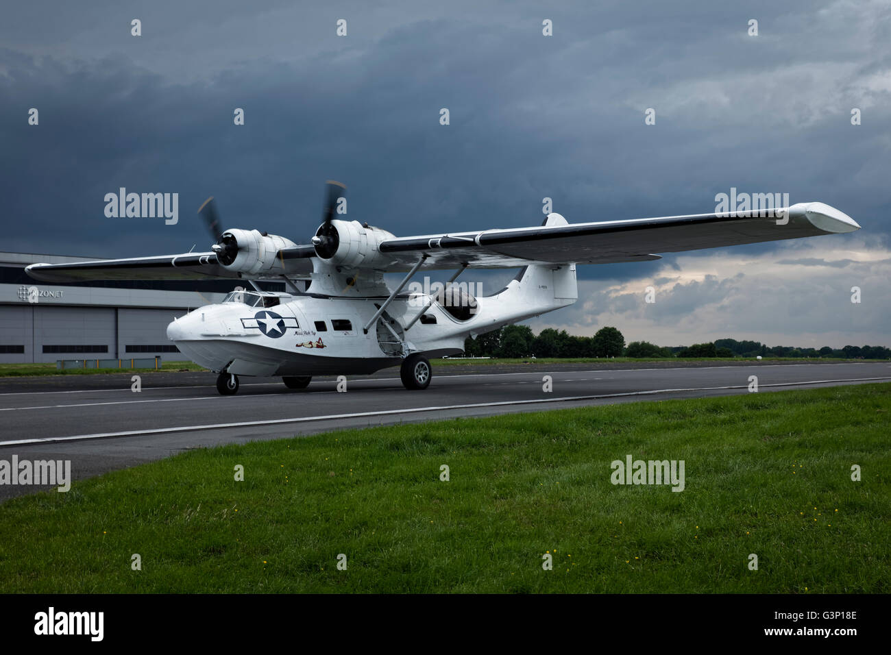 Catalina sea plane taxying on the runway and just about to take off ...