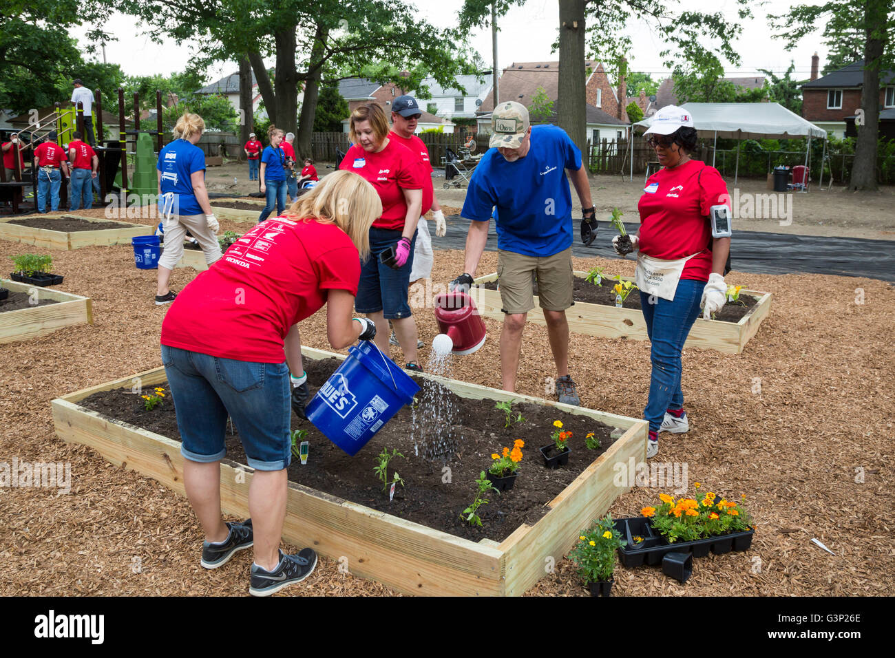 Detroit, Michigan - Volunteers build a playground and community garden ...