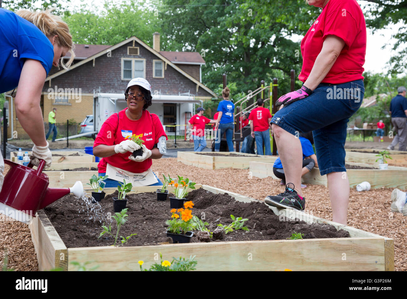 Detroit, Michigan - Volunteers build a playground and community garden ...
