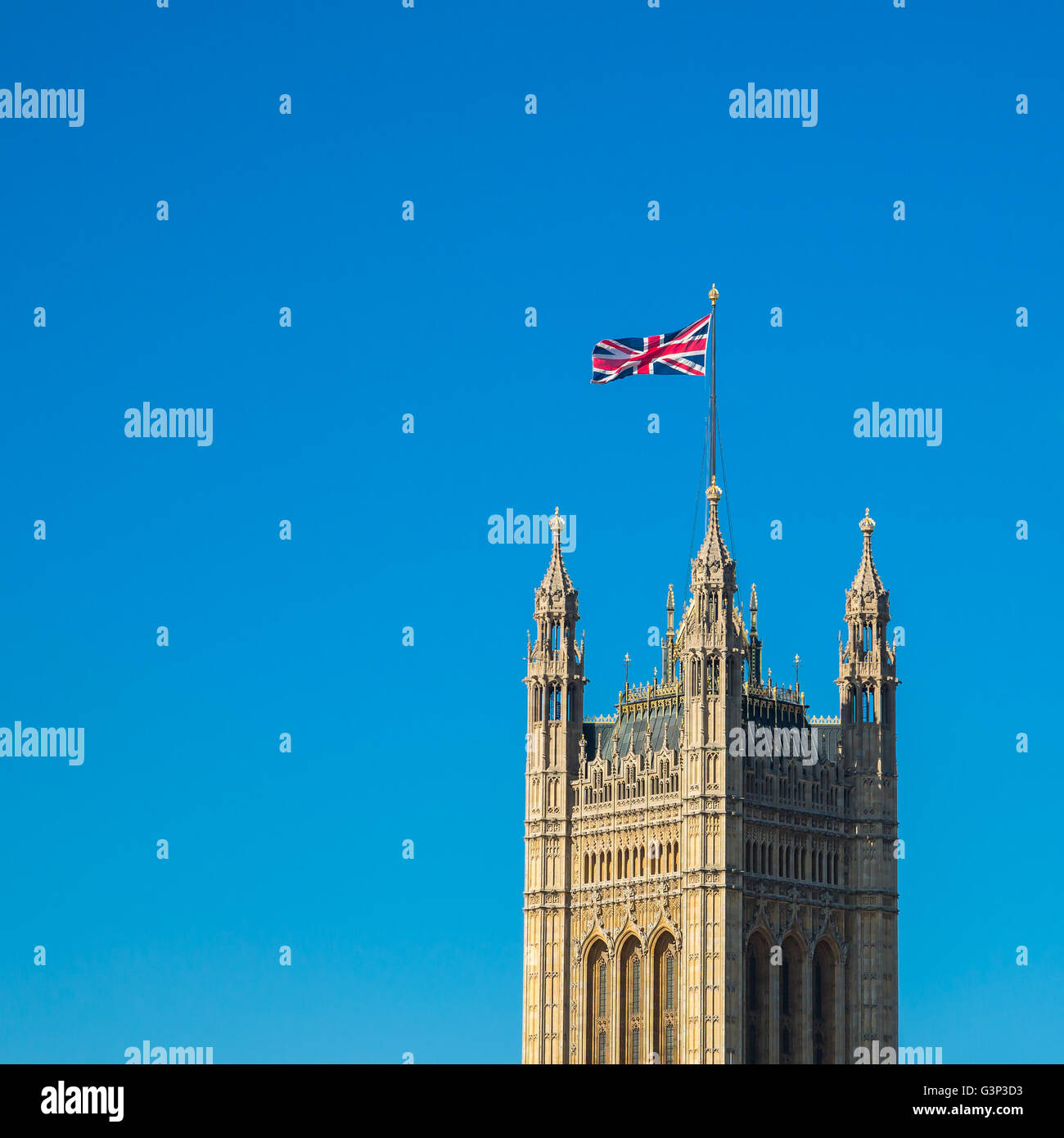 British national flag on top of Parliament building with blue sky Stock ...