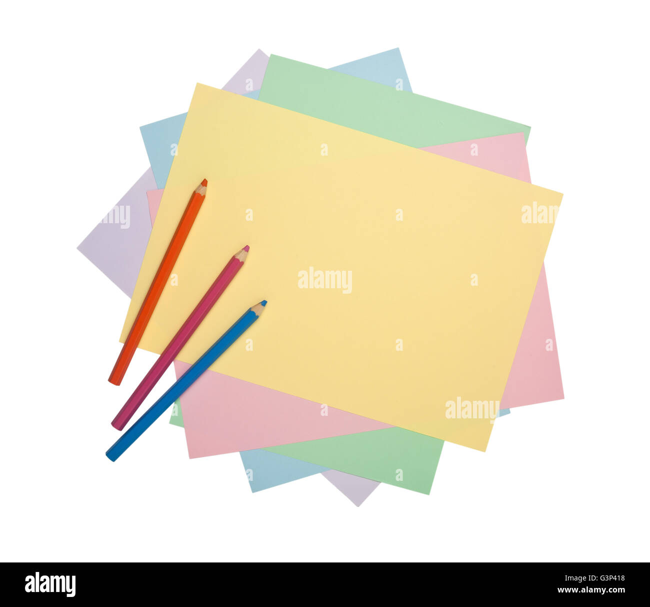 Color pencils and colorful paper isolated on white background Stock ...