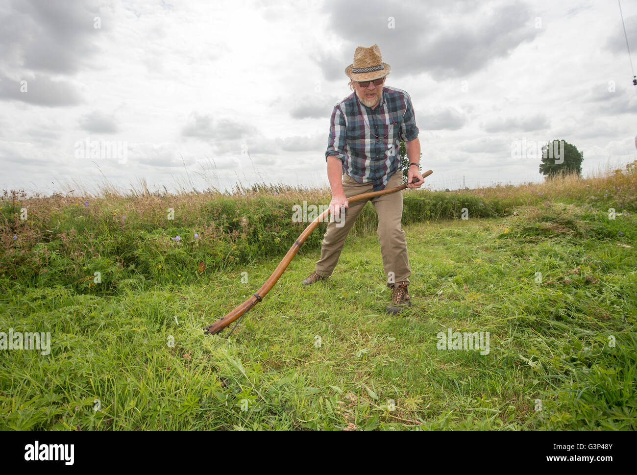 Harvest scythe england hi-res stock photography and images - Alamy
