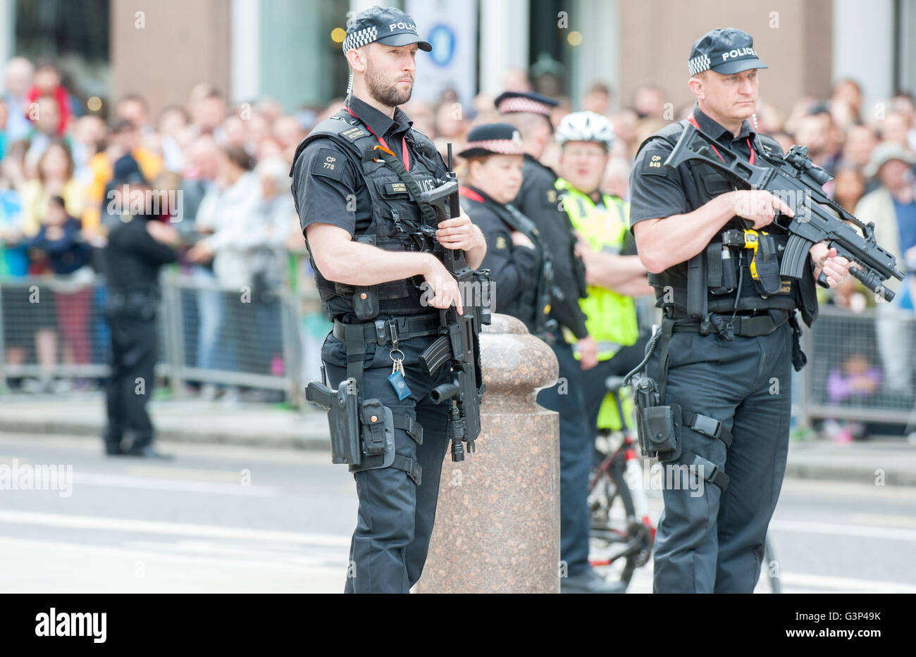 Armed British police officers secure the streets of Windsor for the ...