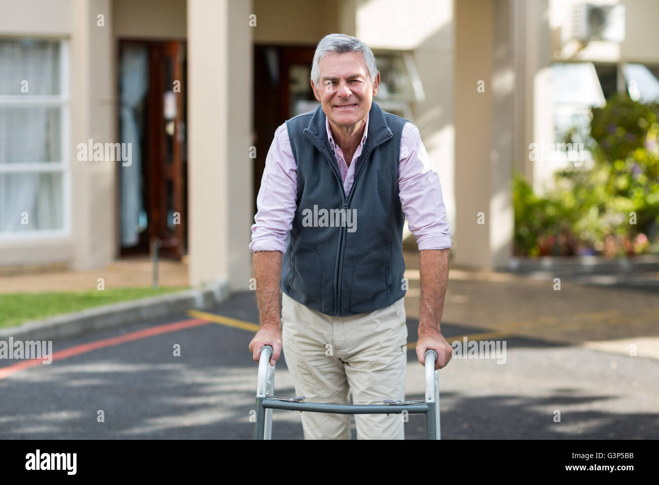 Old man standing a smiling hi-res stock photography and images - Alamy