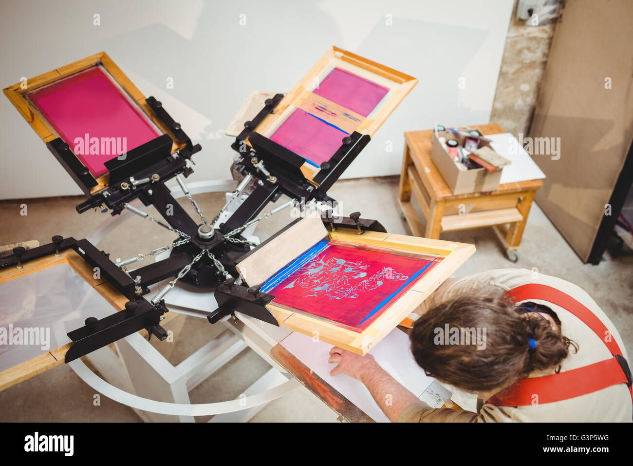 Craftsman painting on wood Stock Photo - Alamy