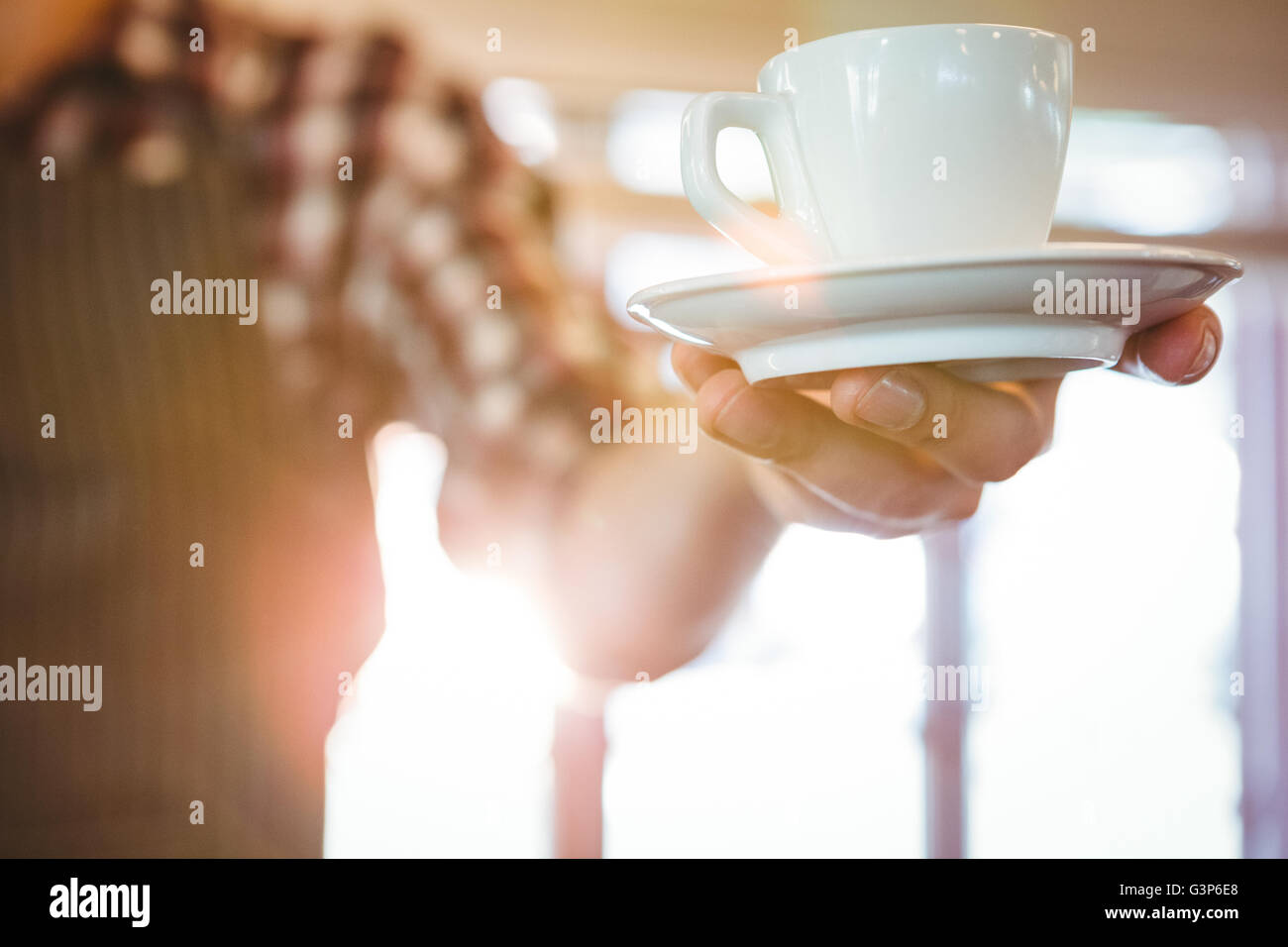 Handing a coffee over hi-res stock photography and images - Alamy