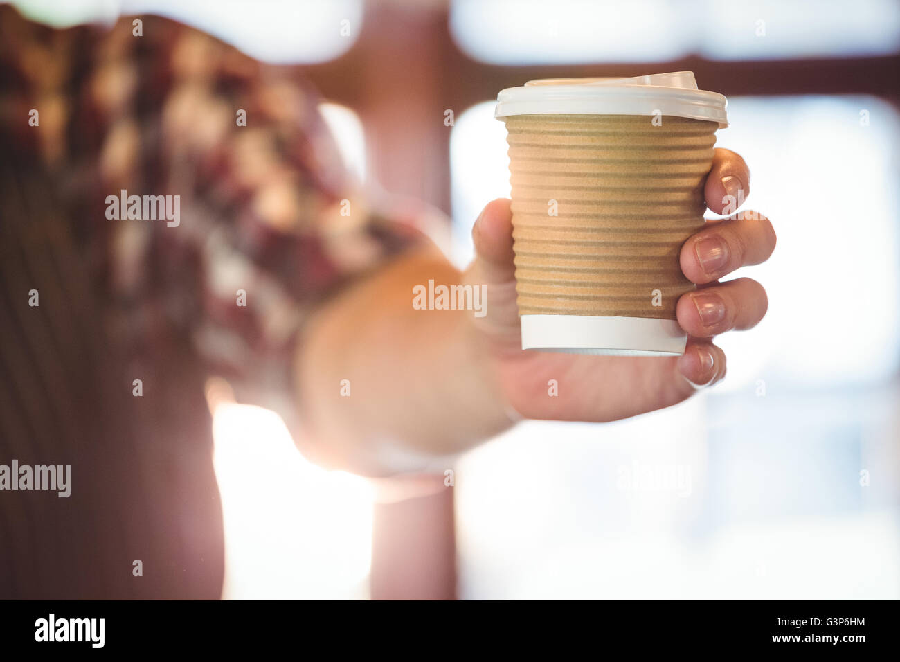 Offering cup hi-res stock photography and images - Alamy