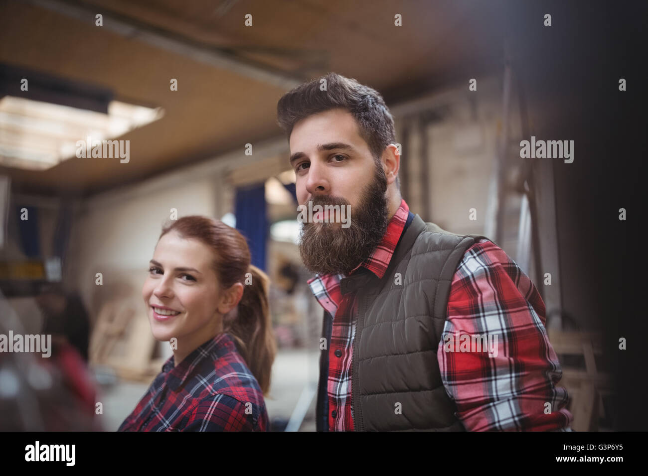 Side view concentrated smiling hi-res stock photography and images - Alamy