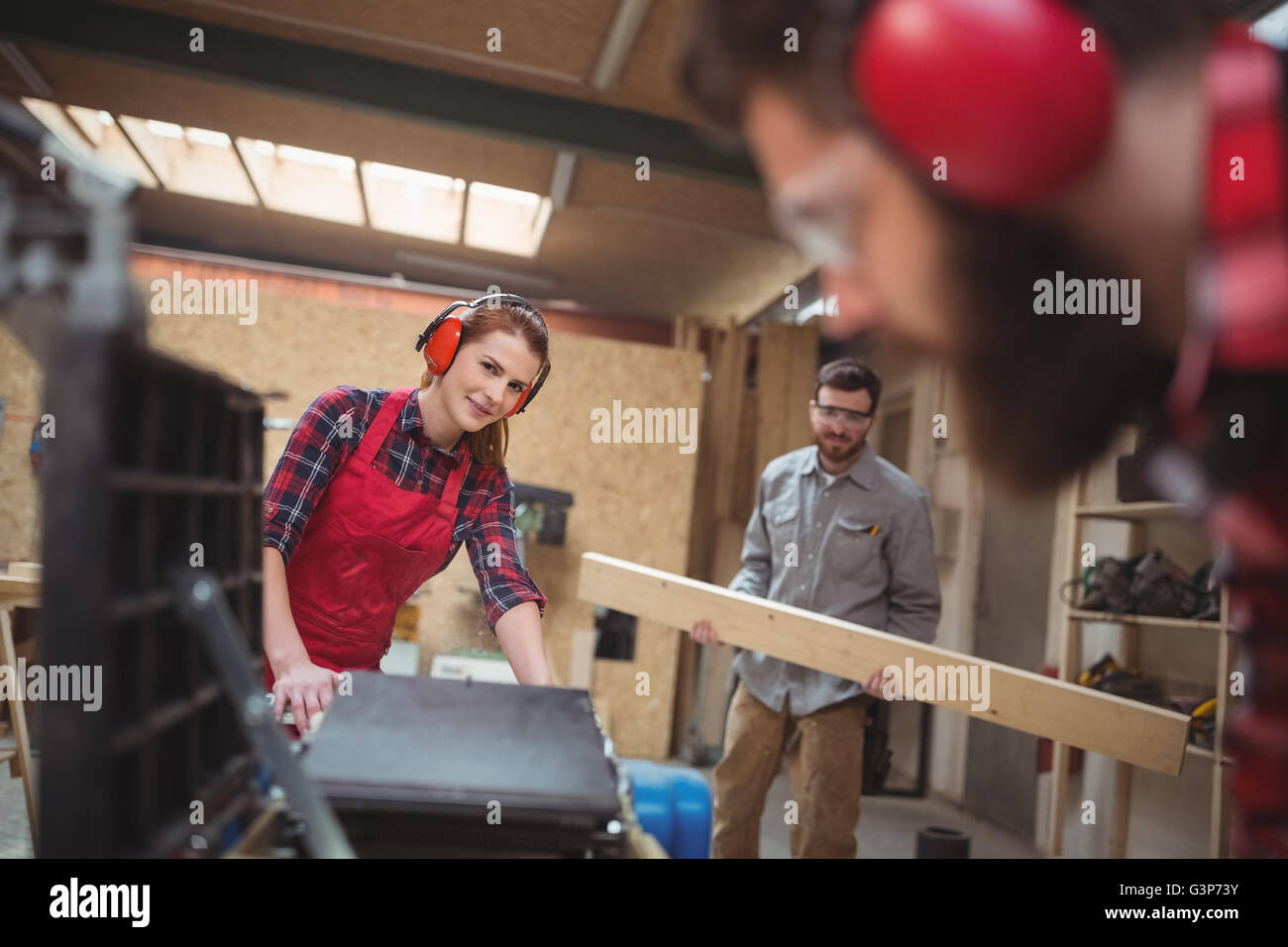 Female carpenter working Stock Photo - Alamy