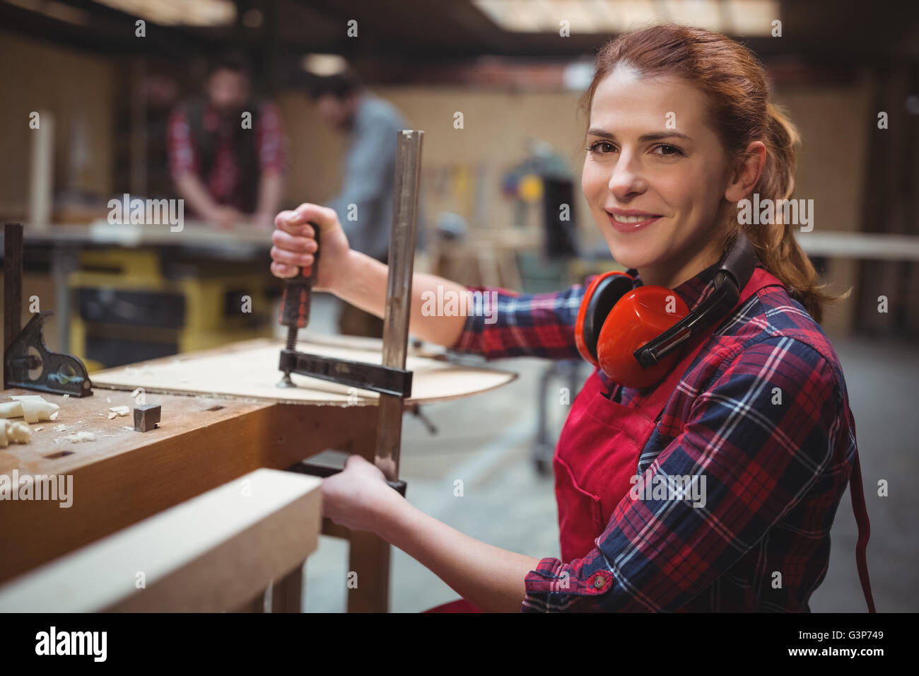Portrait of female carpenter working Stock Photo - Alamy