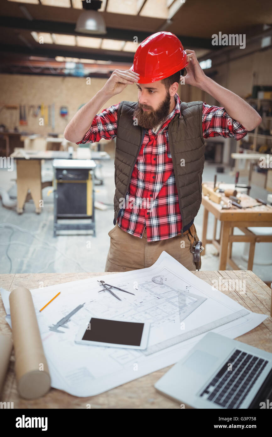 Wearing a helmet hi-res stock photography and images - Alamy