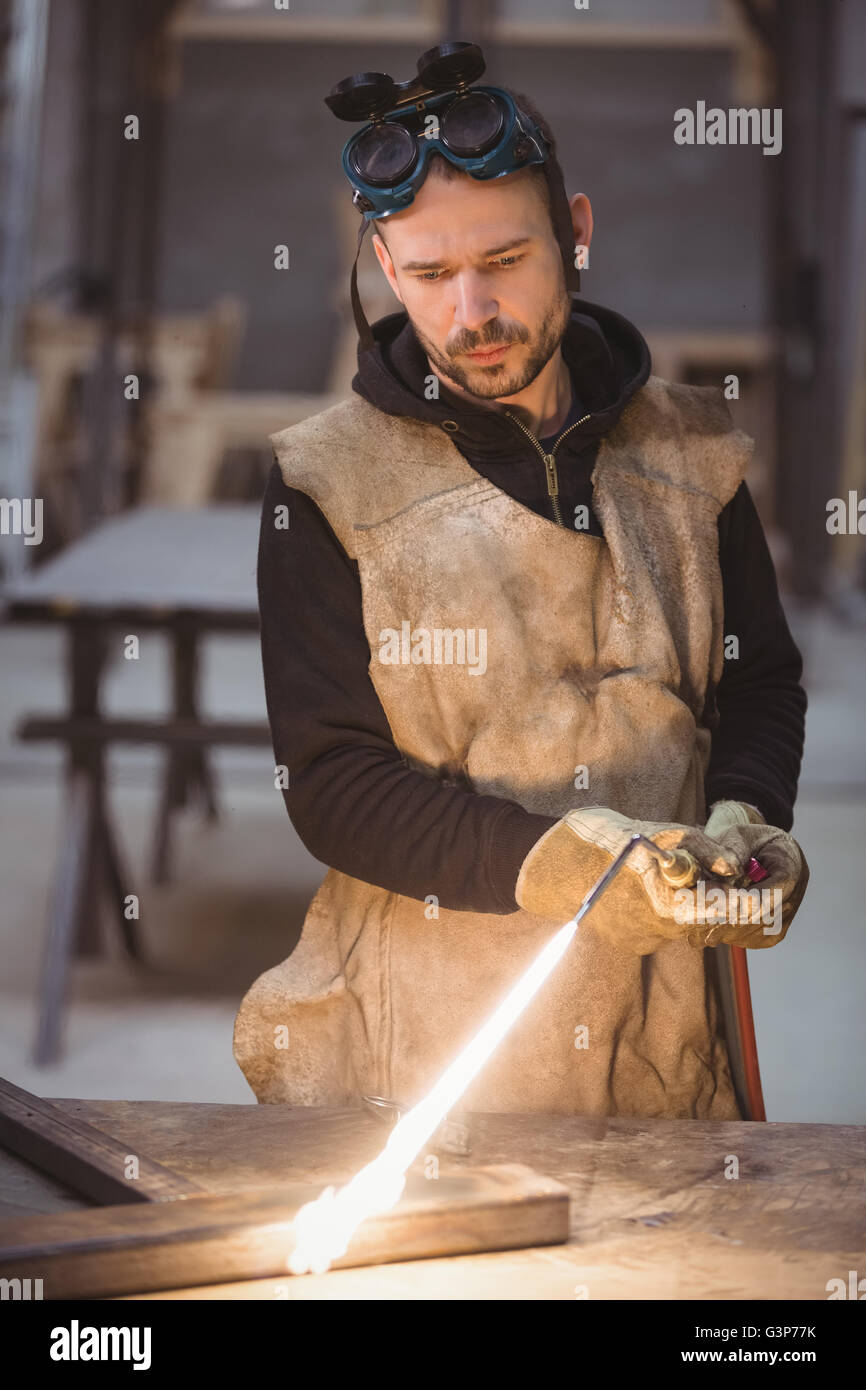 Welder using a welding torch Stock Photo - Alamy