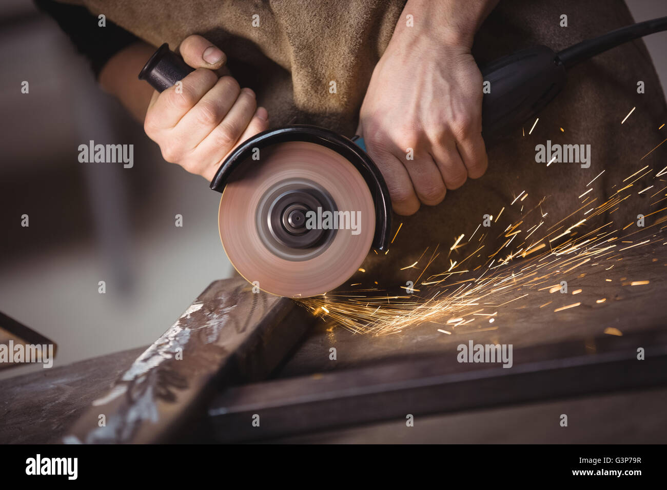 Welder working with machine Stock Photo - Alamy