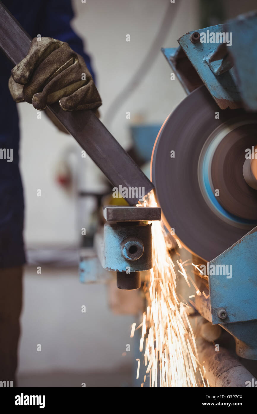 Welder working with machine Stock Photo - Alamy