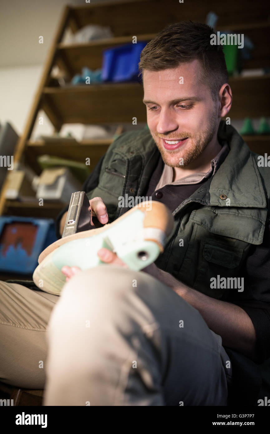 Close up of cobbler making shoes with a hammer Stock Photo - Alamy