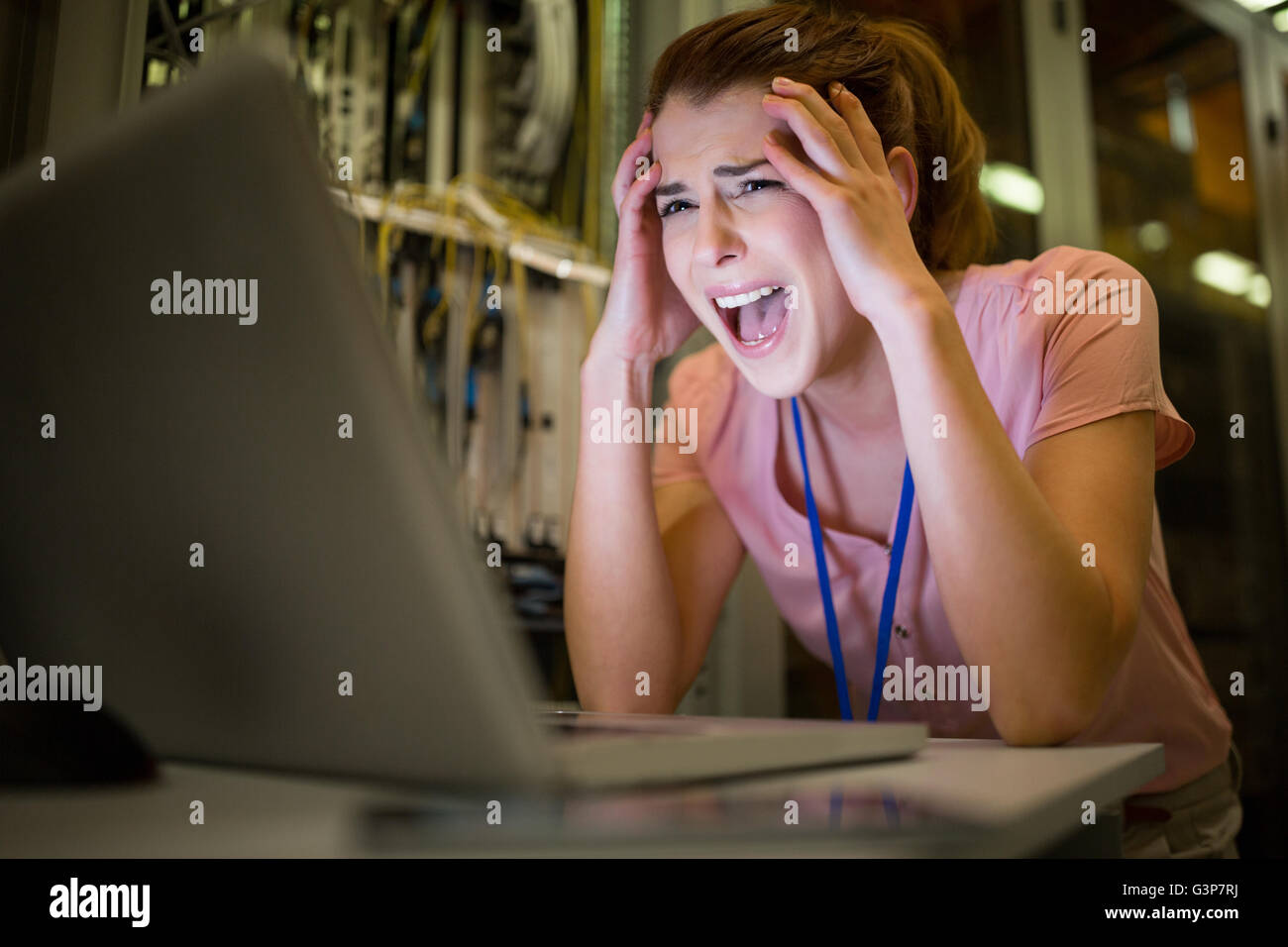 Worried female technician using hi-res stock photography and images - Alamy