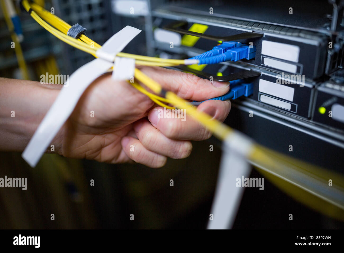 Woman plugging computer hi-res stock photography and images - Alamy