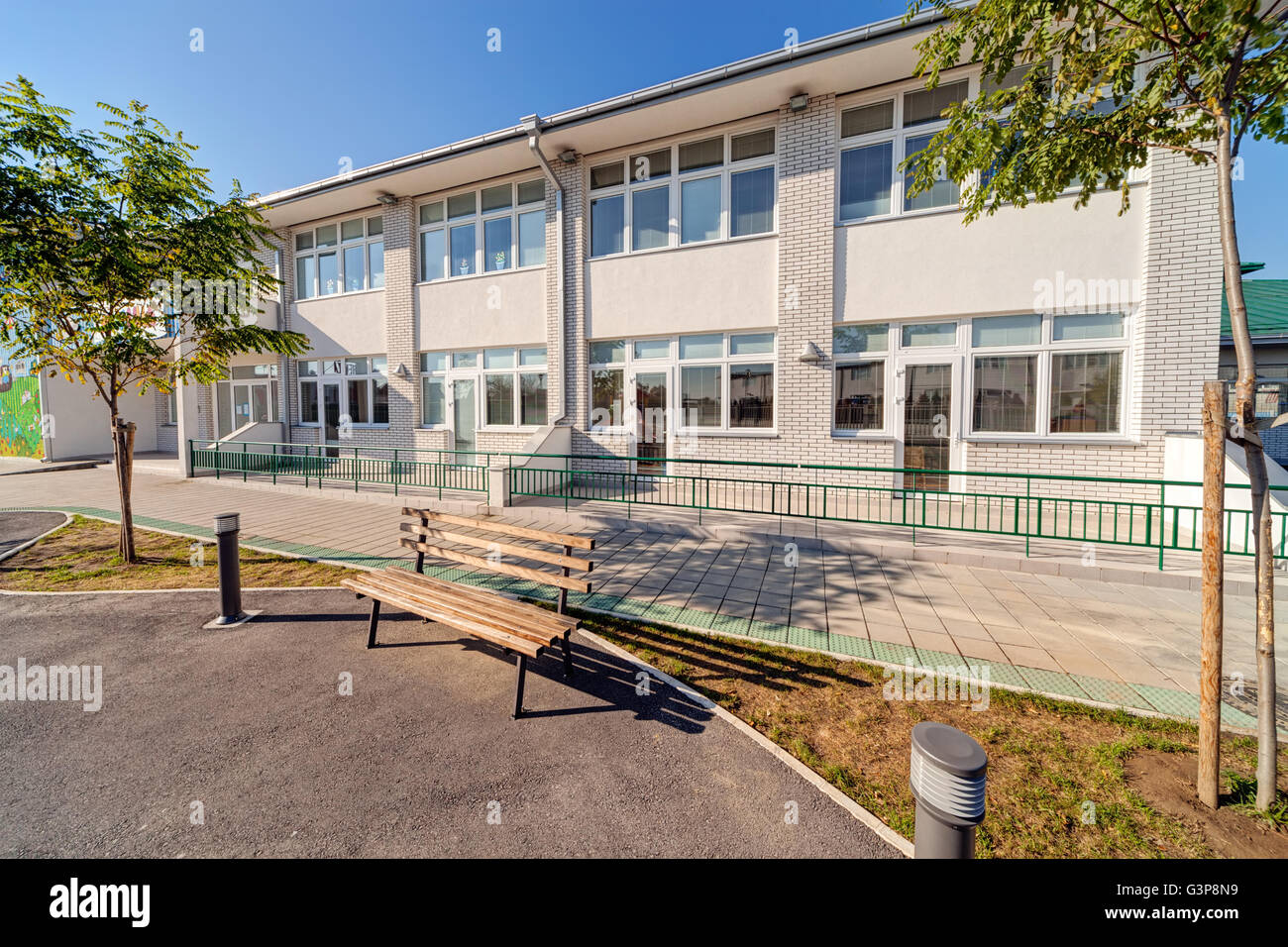 Preschool building exterior with playground on a sunny day Stock Photo ...