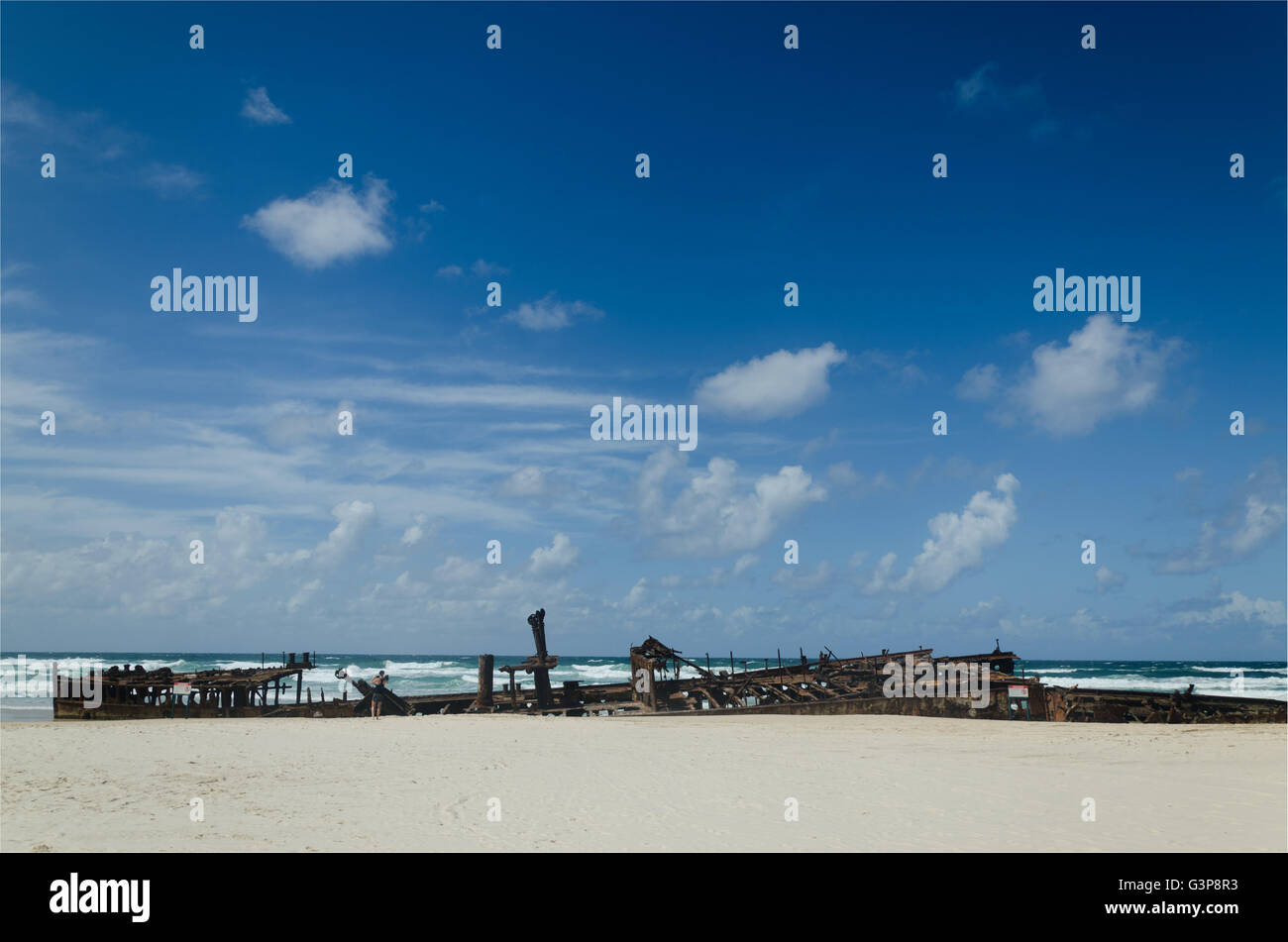 Impressive SS Maheno luxury shipwreck resting on the beach on clear ...