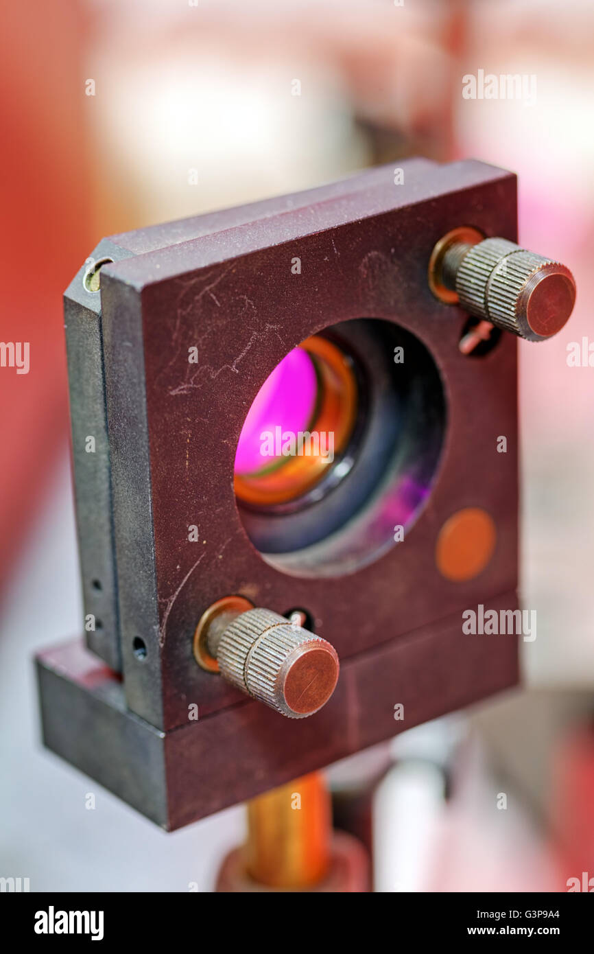 Red laser on optical table in physics laboratory Stock Photo - Alamy