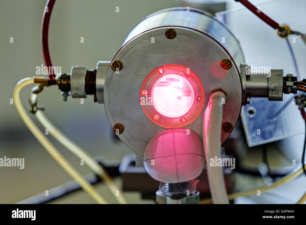 Red laser on optical table in physics laboratory Stock Photo - Alamy