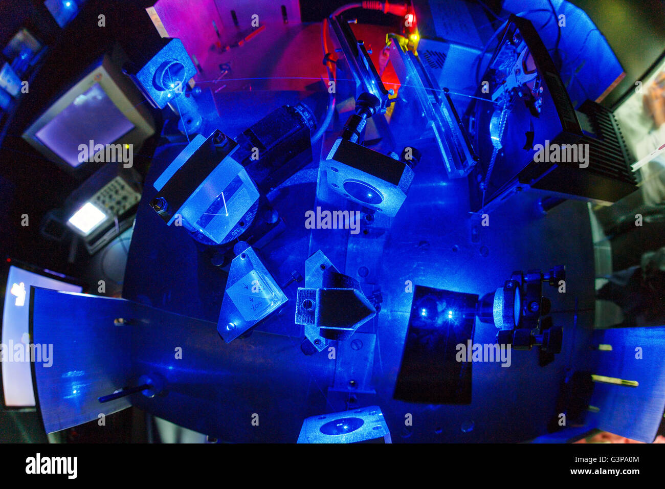 Blue laser on optical table in a quantum optics lab Stock Photo - Alamy