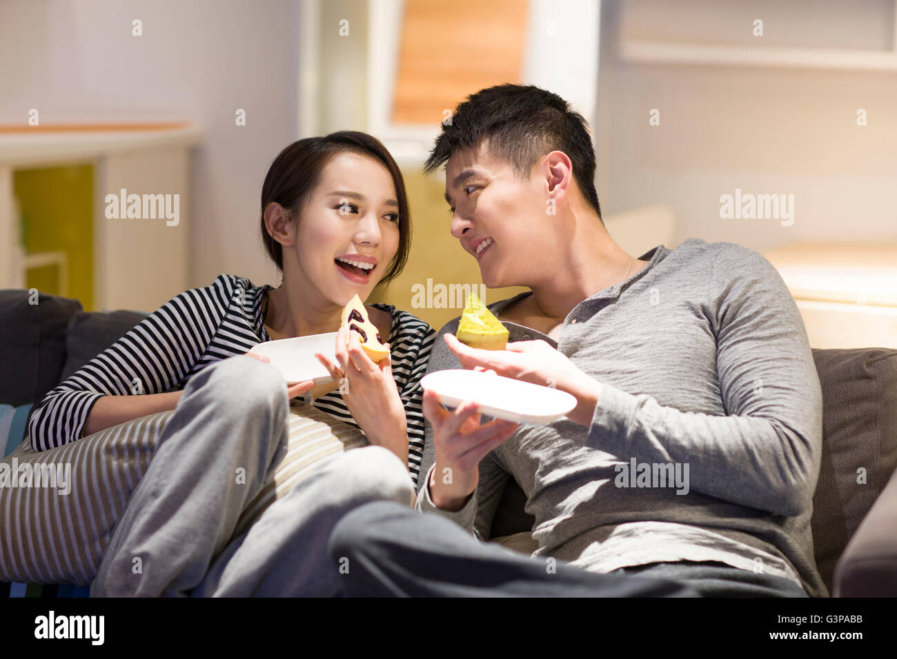 Comfort eating sofa cake hi-res stock photography and images - Alamy
