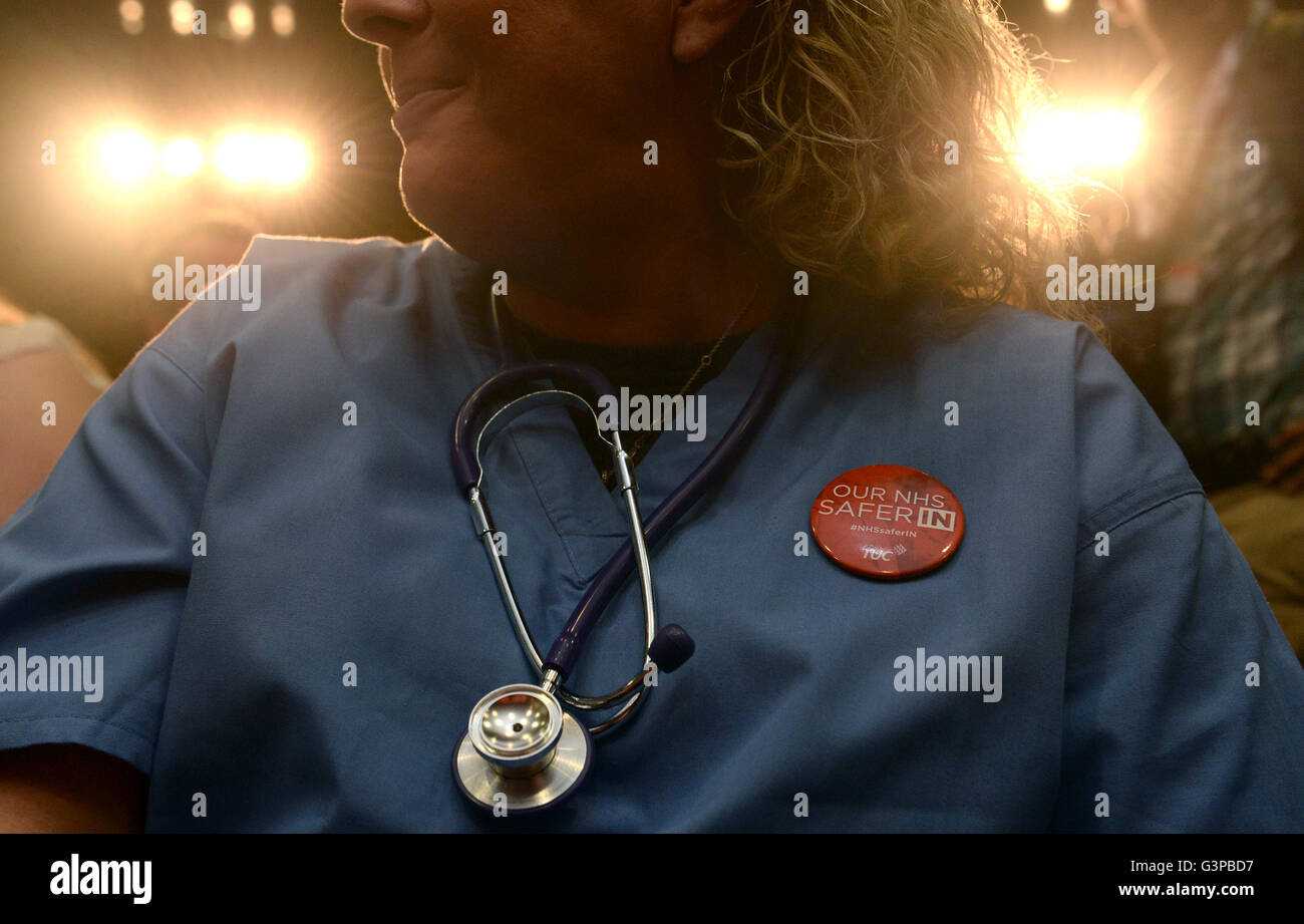 An NHS staff member wears a badge of support as Labour Party leader ...
