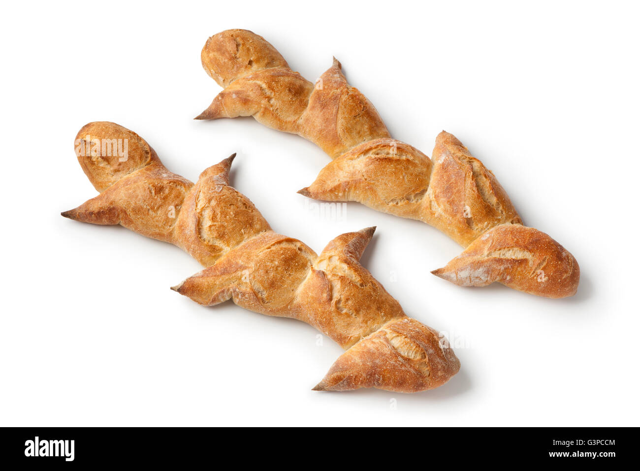 Fresh baked French pain d'epi or wheat stalk bread on white background ...