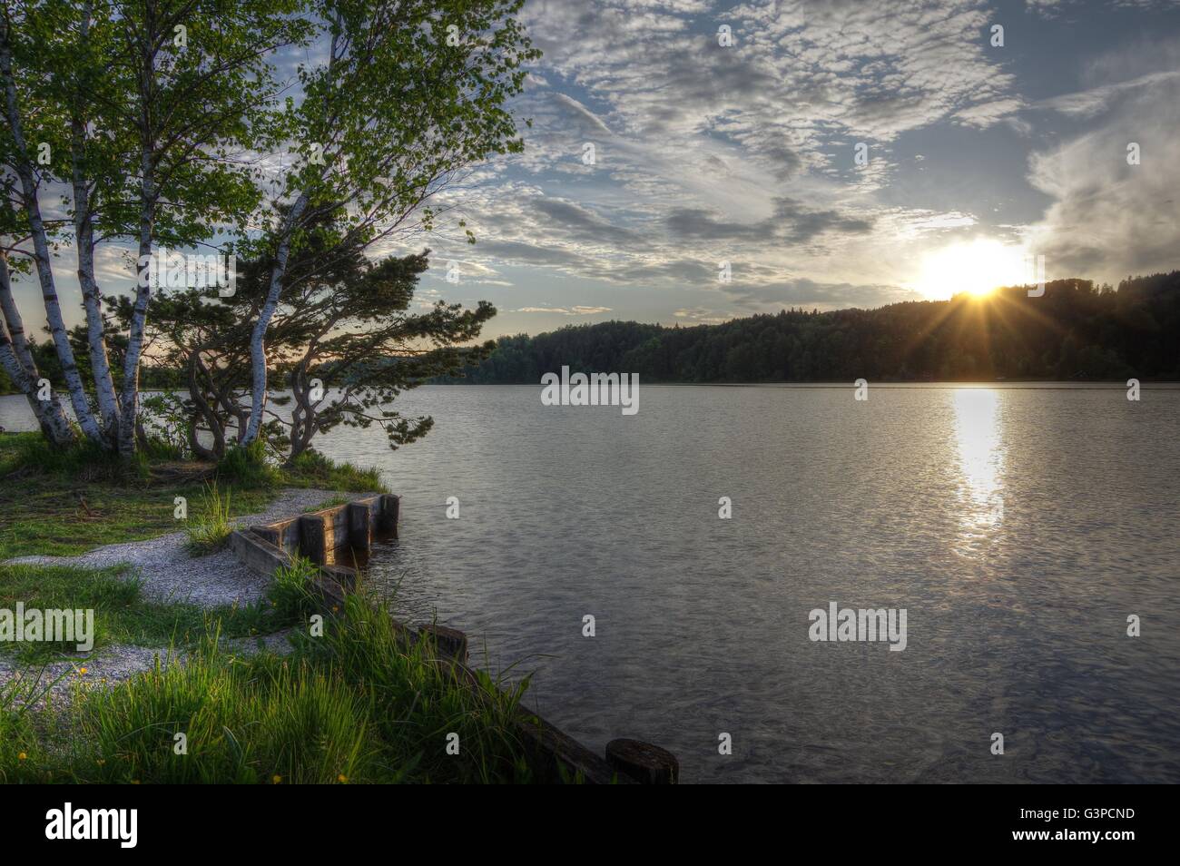 HDR image of a sunset at a lake Stock Photo - Alamy