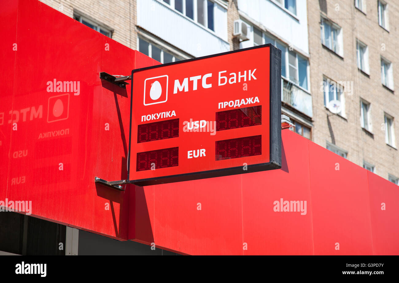 A sign with the logo office of the Russian MTS Bank. Text in russian ...
