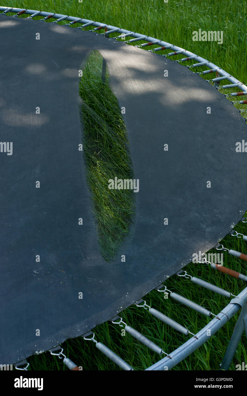 Torn trampoline mat. Polypropylene bed for a trampoline that has split ...