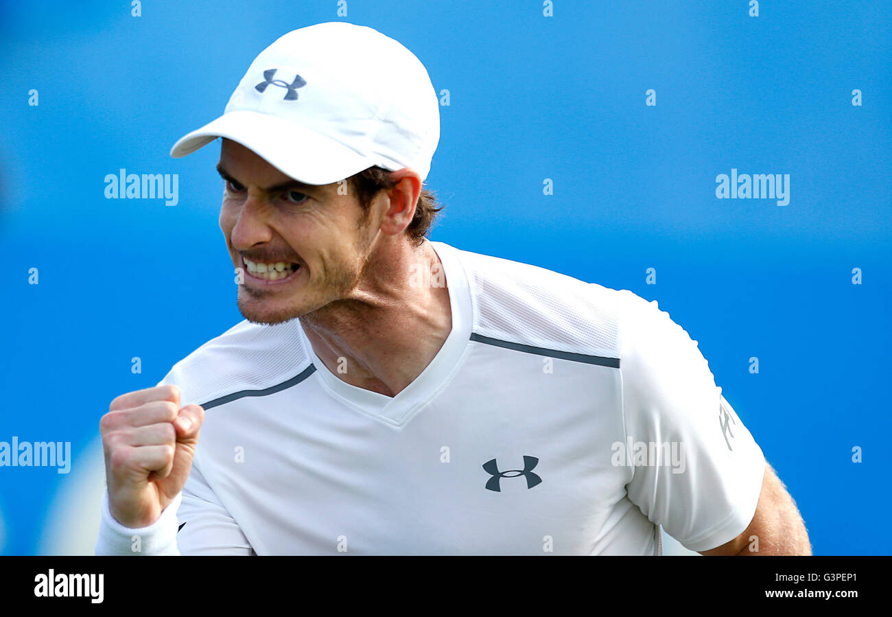 Great Britain's Andy Murray celebrates winning the first set during day ...