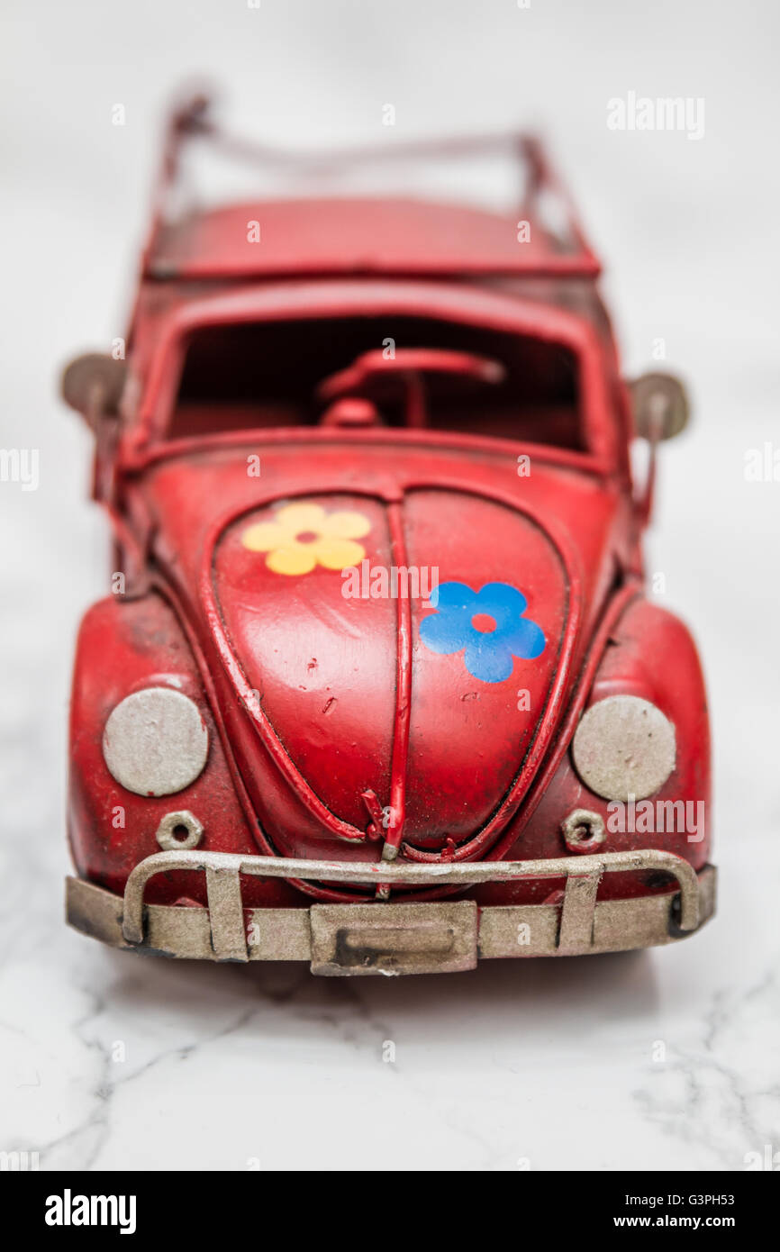 Classic mini red car model on white marble background Stock Photo - Alamy